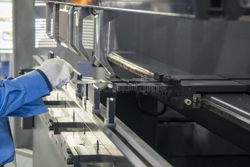 The Hand of Technician Operator Working with Hydraulic Press Brake ...