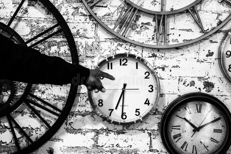 Hand telling time stock photo. Image of time, wall, round - 61093420