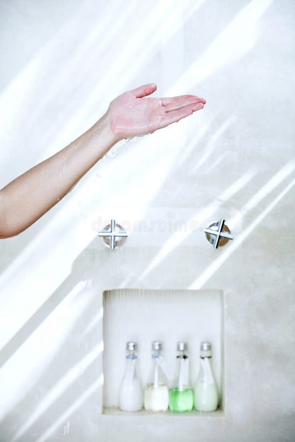 Hand Testing Water from Shower. Conceptual Image Shot Stock Image ...