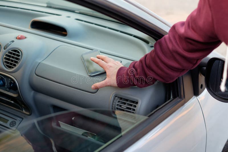 Hand of a Thief Stealing a Mobile Phone Stock Image - Image of crime ...