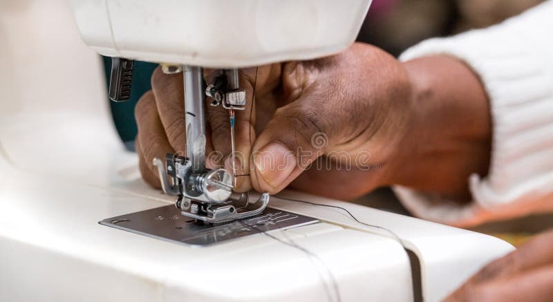 Hand Threading Needle into Sewing Needle Stock Photo - Image of ...