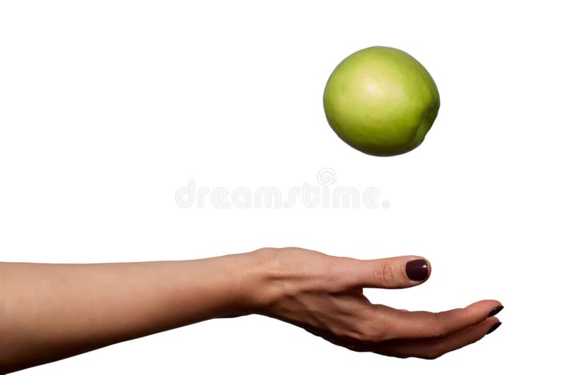 Hand throwing apple stock photo. Image of isolated, fruit - 184119668
