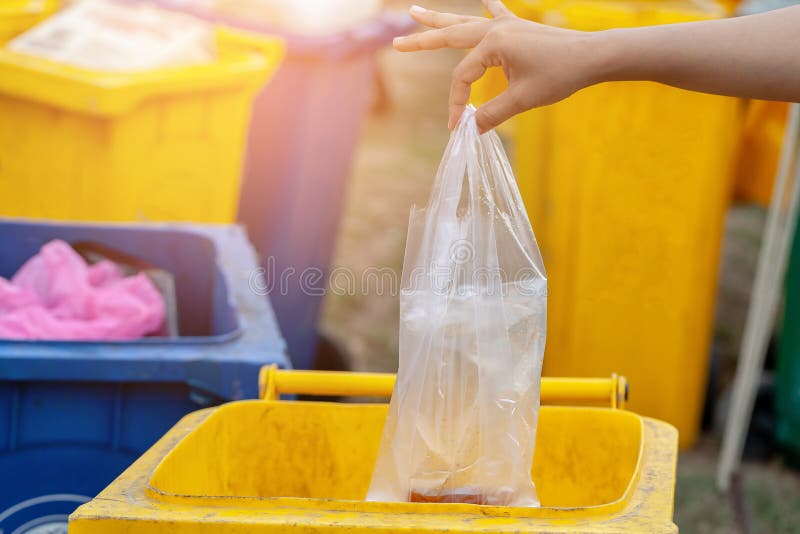 Hand Throwing a Garbage in the Trash.selective Focus Stock Image ...