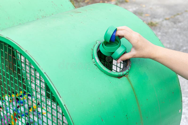 Hand Throwing Plastic Caps Urban Recycling Bin Stock Photos - Free ...