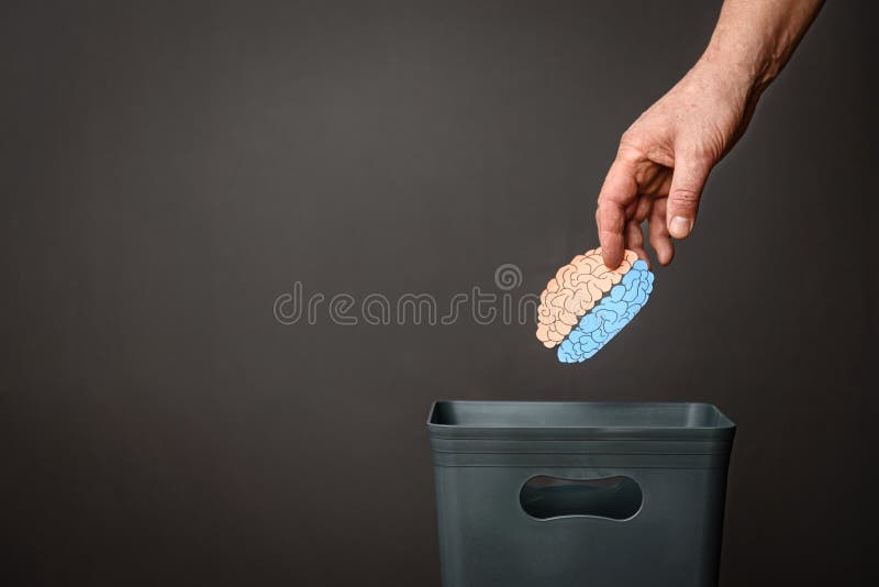Hand Throws Away the Paper Brain is Thrown into the Trash Stock Photo ...
