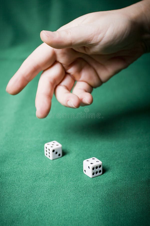Hand Rolling Dice For Gambling Or Gaming Stock Photo - Image of ...