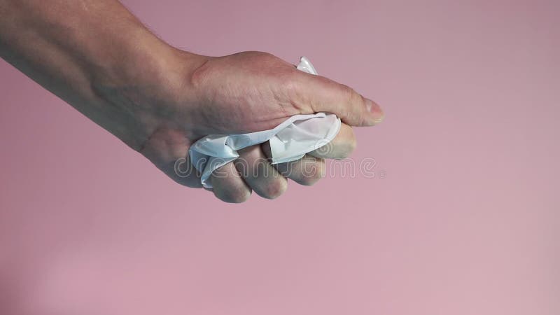 Hand Throws Out a Plastic Cup on a Pink Background. Environmental ...