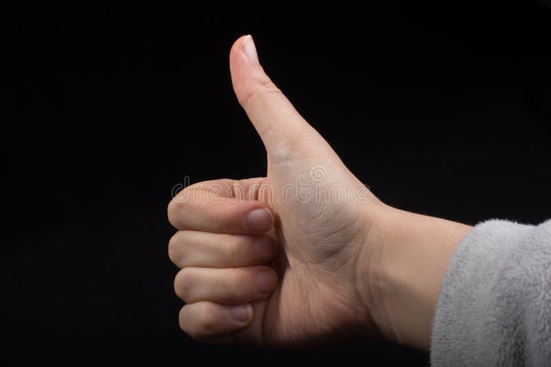 Hand with Thumb Up Isolated on Black Stock Photo - Image of conceptual ...