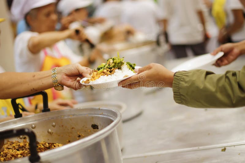From Hand To Hand : Sharing Food with Homeless Stock Image - Image of ...