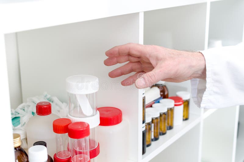 Hand To Take Sample Container Stock Photos - Free & Royalty-Free Stock ...