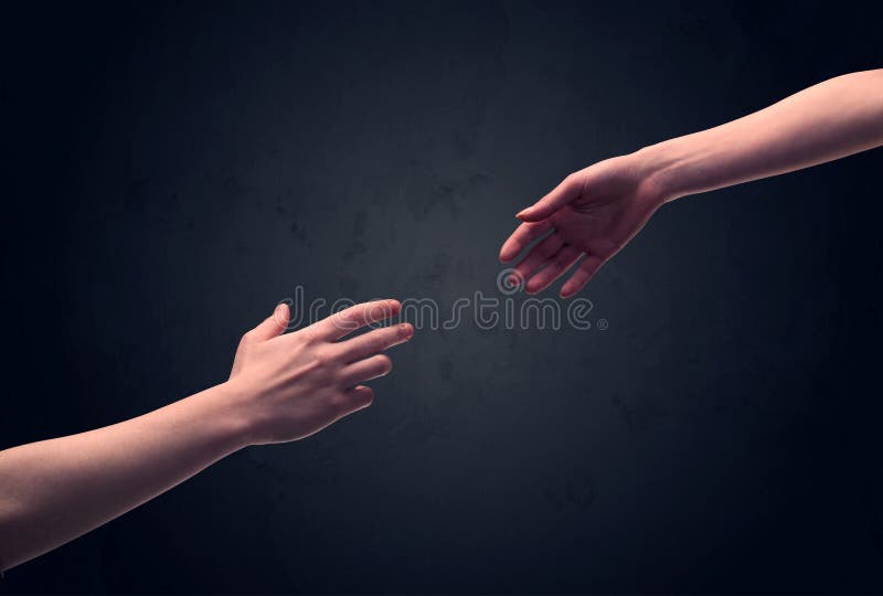 Hand Reaching Out Of Darkness