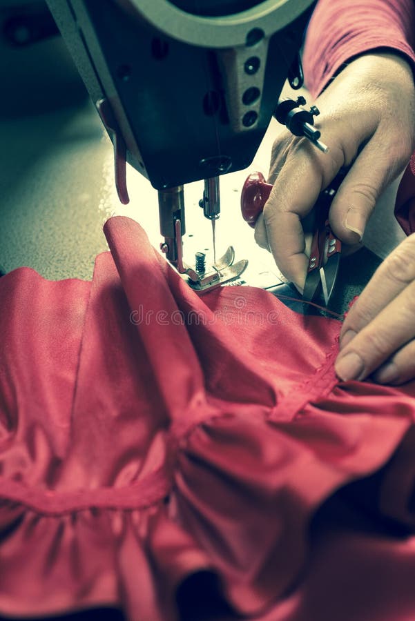 Hand about To Trim Excess Thread from a Sewn Cloth Stock Image - Image ...