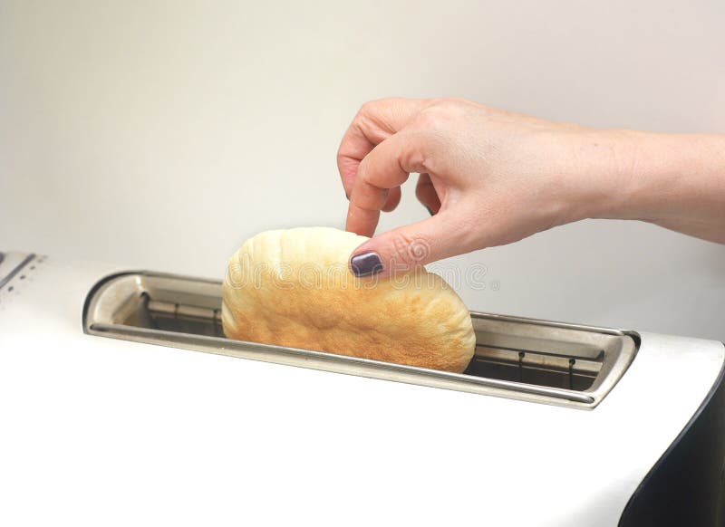 Hand and Toaster stock image. Image of bread, lifestyle - 108427727