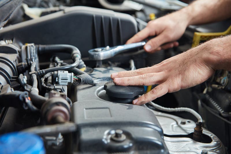 Hand with Tool on Car Engine during Inspection Stock Image - Image of ...