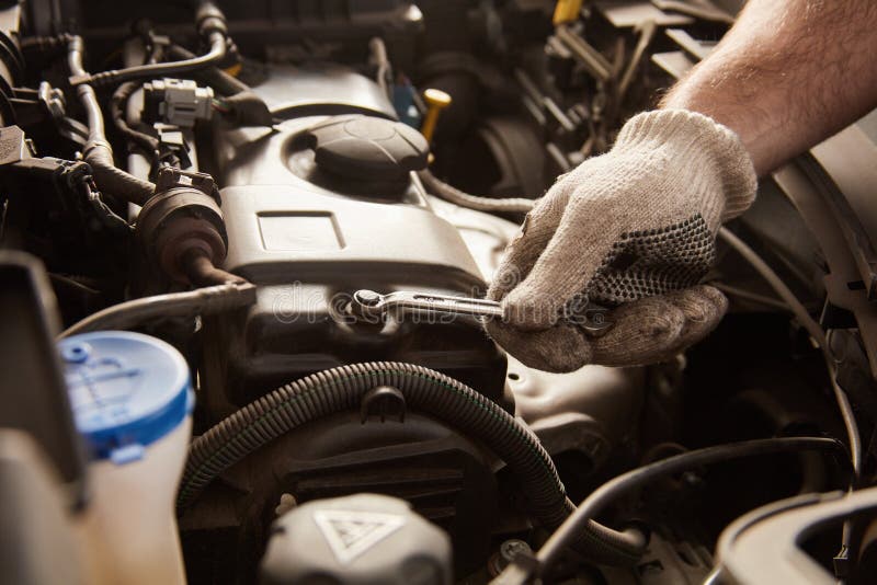 Hand with Tool in the Repair of Car Engine Stock Image - Image of ...