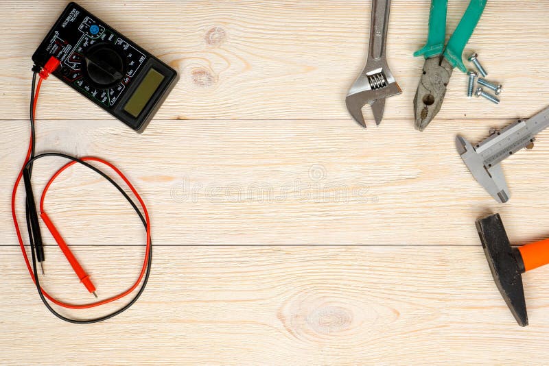 Hand Tools and Multimeter on Wooden Table Stock Photo - Image of ...