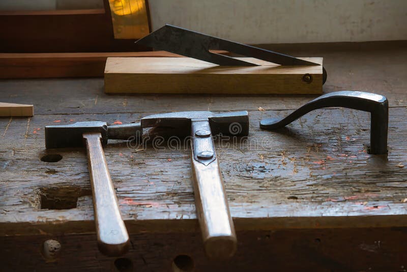 Hand Tools Resting on a Worn Workbench. Stock Photo - Image of wall ...