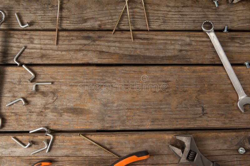Hand tools on wooden table stock photo. Image of pliers - 93241112