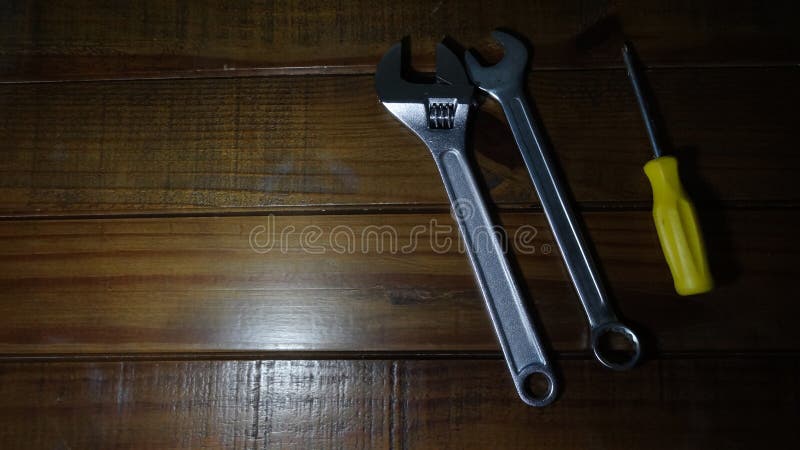 Hand Tools on a Wooden Table. Stock Photo - Image of hand, wrench ...