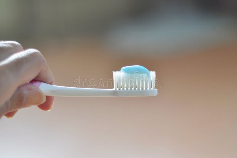 Hand with toothbrush stock photo. Image of bathroom, hygiene - 37933808