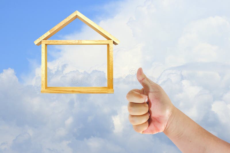 Hand touch home model stock photo. Image of building - 24782370