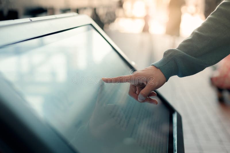 Hand Touch the Interactive Display on the Self-service Machine Check in ...