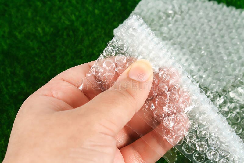 The Hand Touches Bubble Wrap. the Concept of Touch, Tactility, Feelings ...