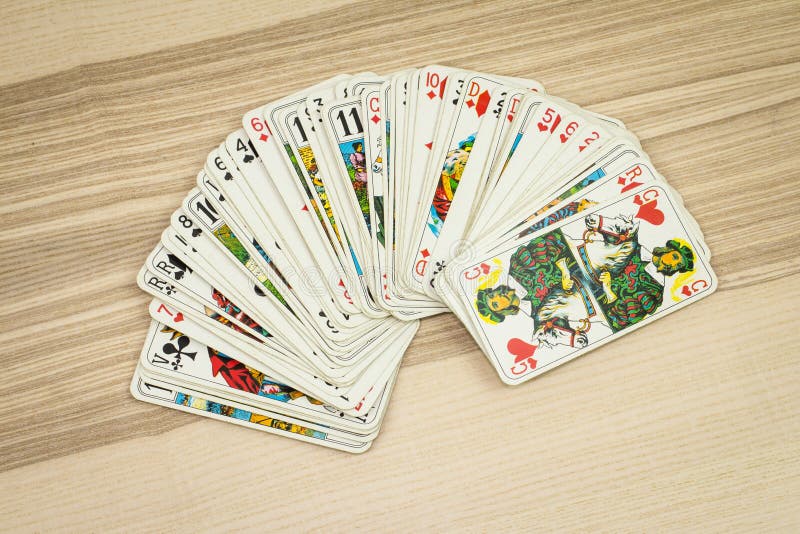 Hand touches deck of cards stock photo. Image of hand - 63056948