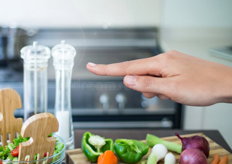 Hand Touching Air with Cooking Objects in Kitchen Stock Image - Image ...