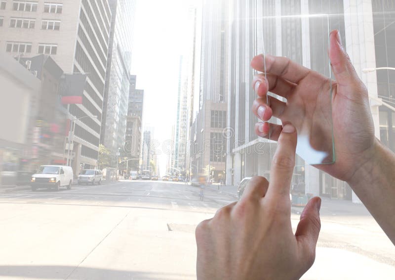 Hand Touching Glass Screen in City with Tall Buildings Stock Photo ...