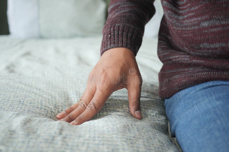 Hand Touching and Pressing Orthopedic Mattress on Bed. Stock Image ...