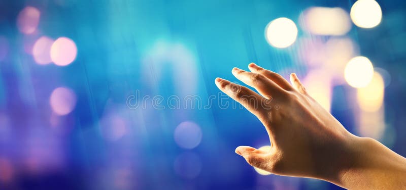 Hand touching a screen stock photo. Image of glitter - 152737560