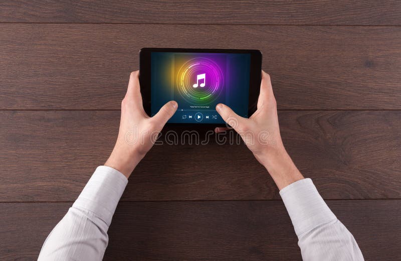 Hand Holding Tablet with Music Play Concept Stock Image - Image of disk ...