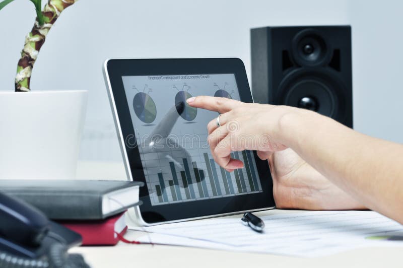 Hand touching tablet pc stock image. Image of information - 25472755