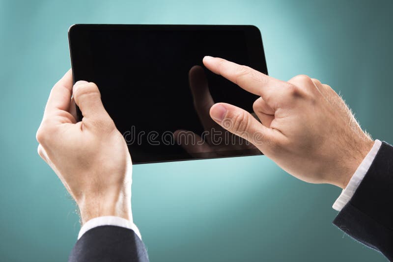 Hand touching the tablet stock photo. Image of touching - 52805318