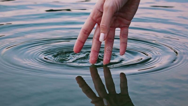 Hand Touching Water Creating Ripples, Reflection Concept Stock Video ...