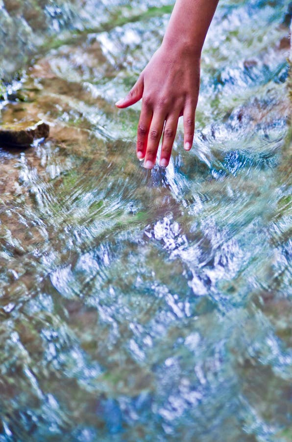 Hand Touching Water, Source of Life Stock Photo - Image of environment ...