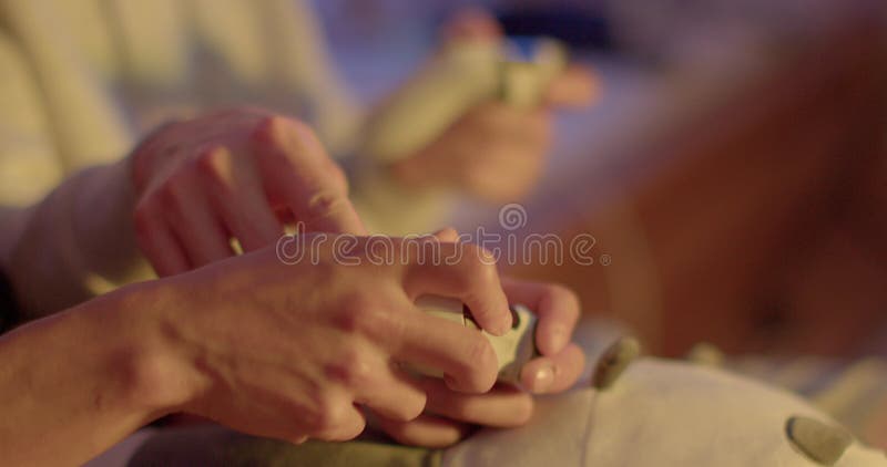 Hand Training in the Game. Close-up Players Hands Controllers Stock ...