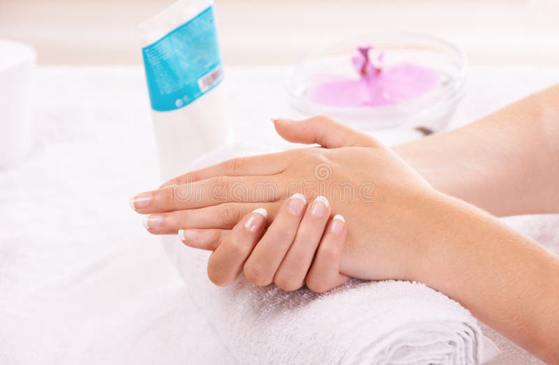 Hand Treatment. a Womans Hands Resting on a Towel. Stock Photo - Image ...