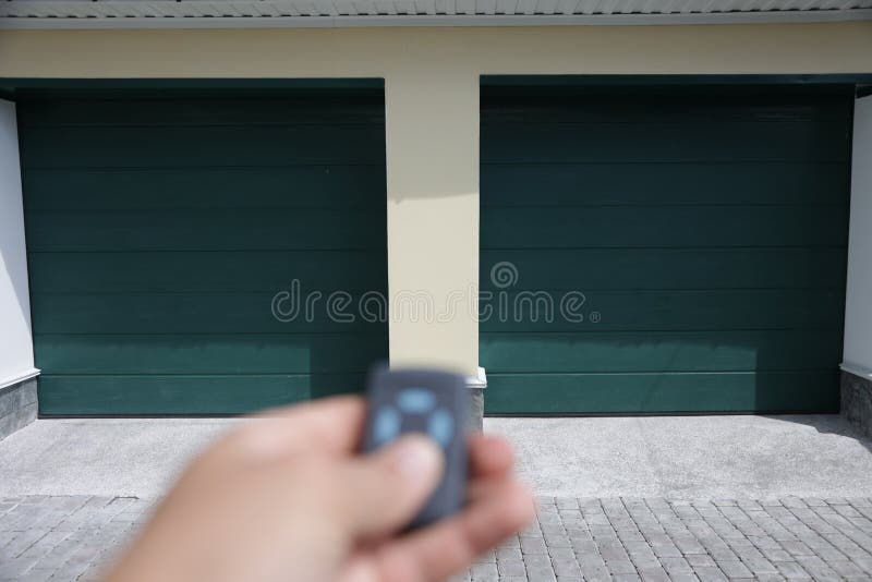 The Hand Tries To Open the Garage Door with the Remote Control Stock ...