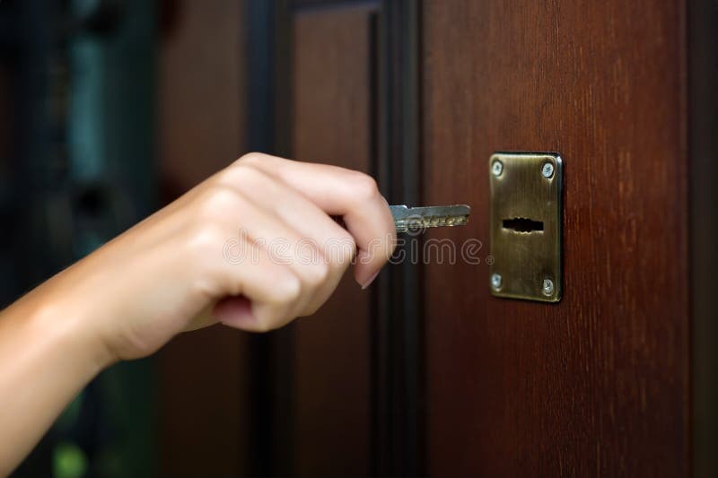 Hand is Trying To Insert the Wrong Key into the Keyhole Stock Image ...