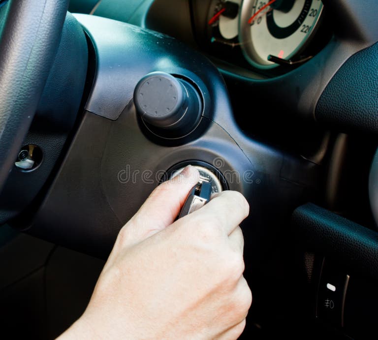 A hand turning a car key stock image. Image of technology - 22958529