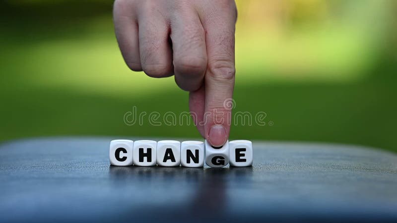 Hand is Turning a Dice and Changes the Word Change To Chance Stock ...