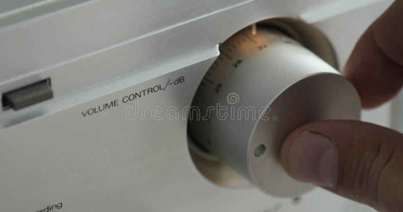 Hand is Turning Down the Volume in a Stereo. Stock Footage - Video of ...