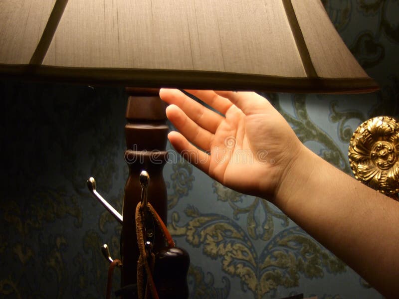 Hand turning off light stock photo. Image of reaching - 31661330