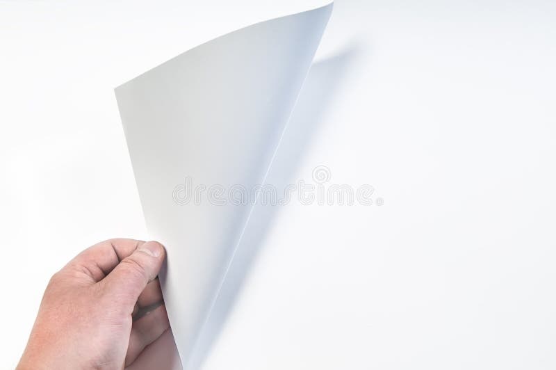 Hand turning page stock photo. Image of copy, displaying - 144124024