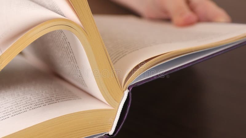 Hand Turning the Pages of a Paper Book Stock Video - Video of student ...