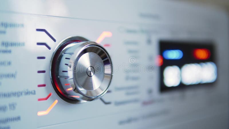 Setting Washing Program To the Right Option and Pressing the Button ...