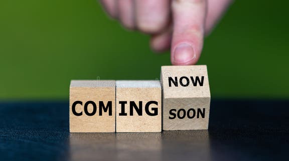 Hand Turns Cube and Changes the Expression Coming Soon To Coming Now . Stock Photo - Image of ...