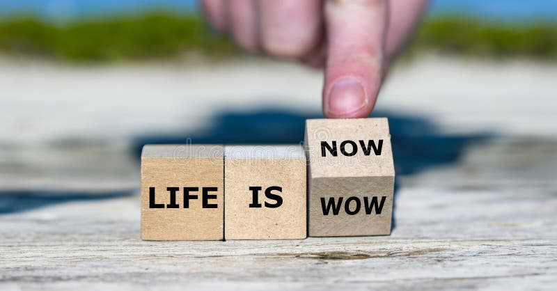 Hand Turns Cube and Changes the Expression Life is Wow To Life is Now ...